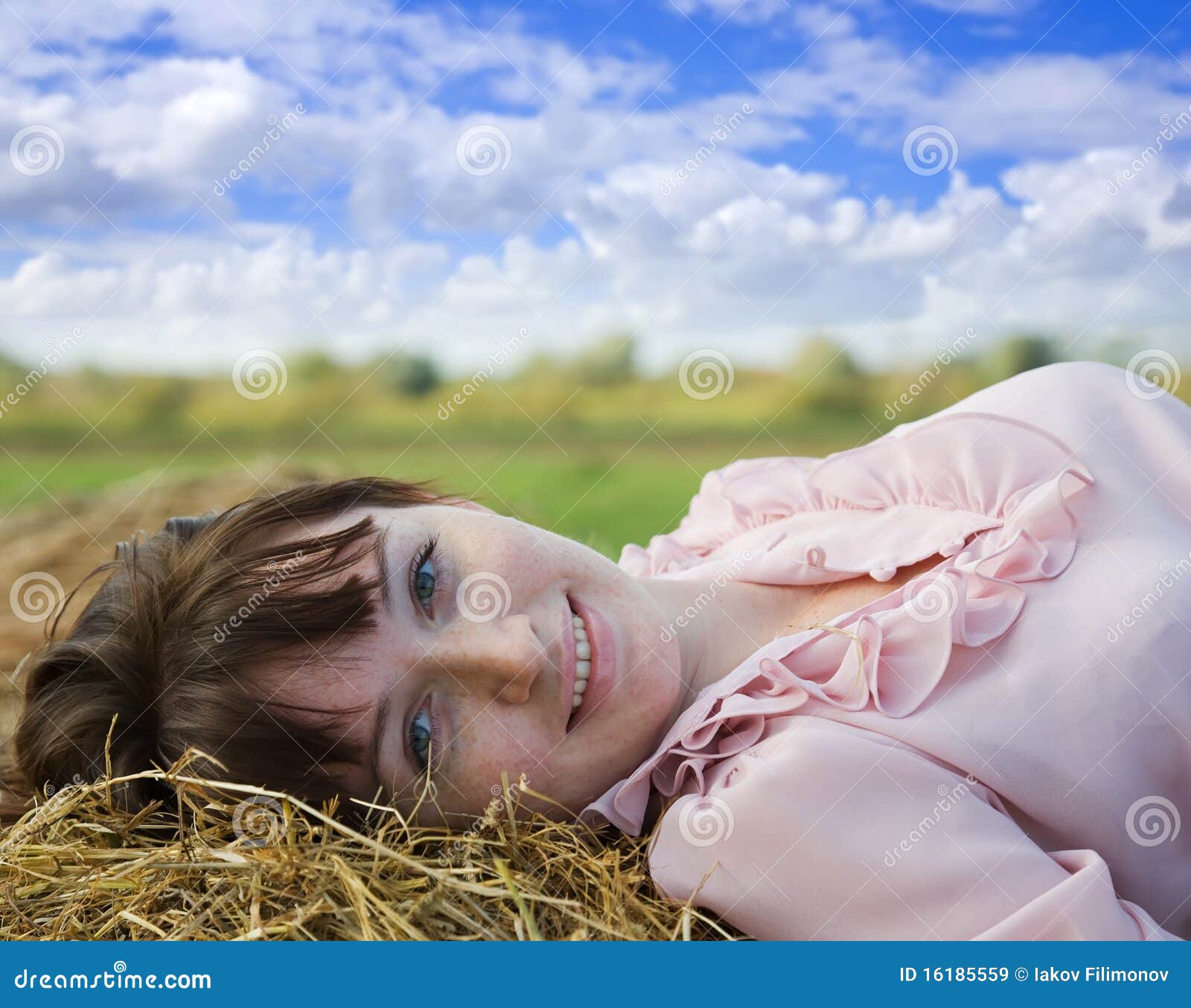 Girl resting on hay stock image. Image of happiness, barn - 16185559