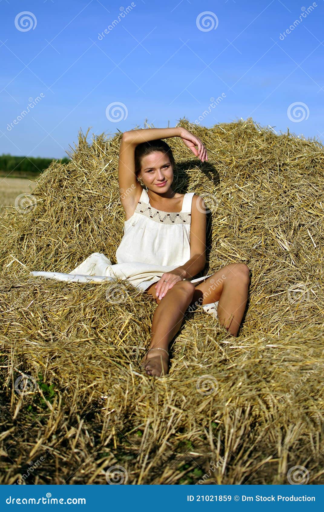 Girl resting on a haystack stock image. Image of ethnic - 21021859