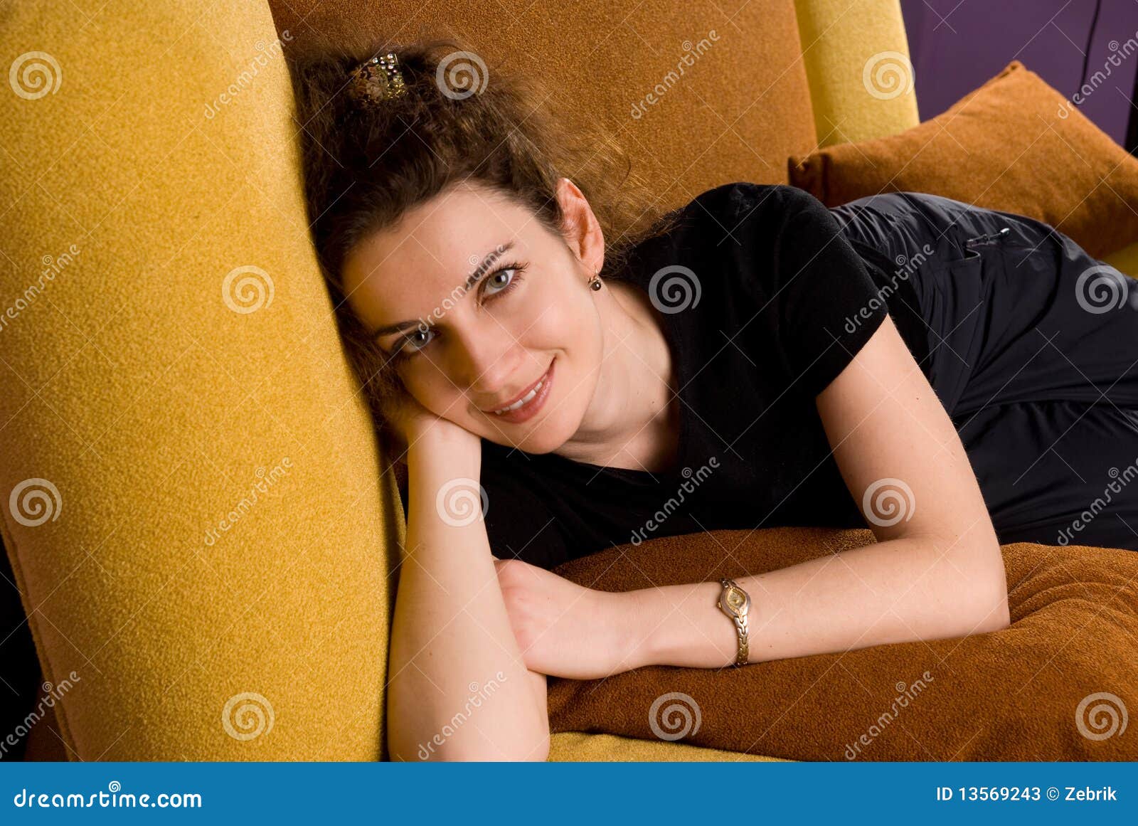 Girl resting on the sofa stock image. Image of adult - 13569243