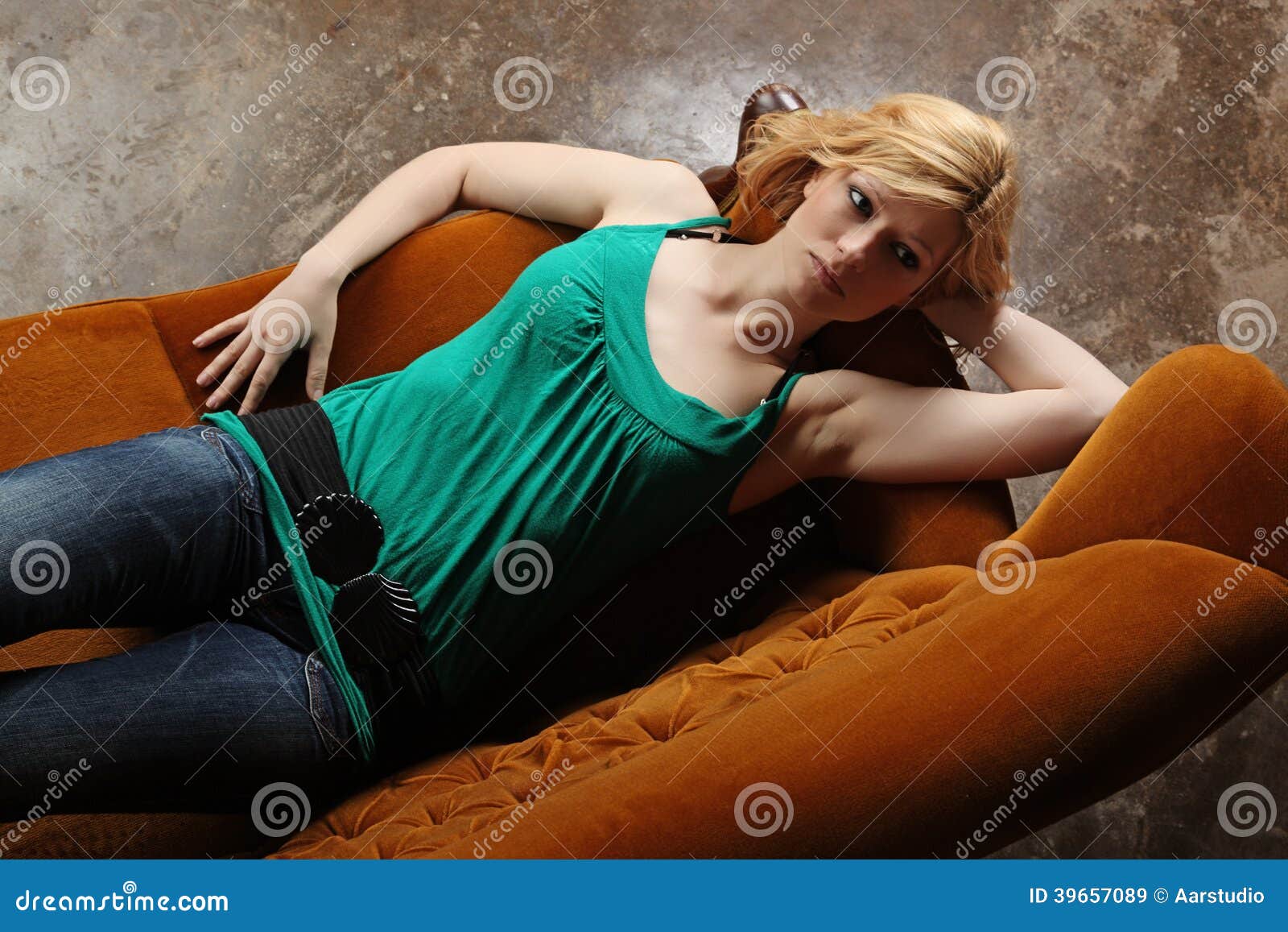 Girl resting on a sofa stock image. Image of fashionable - 39657089