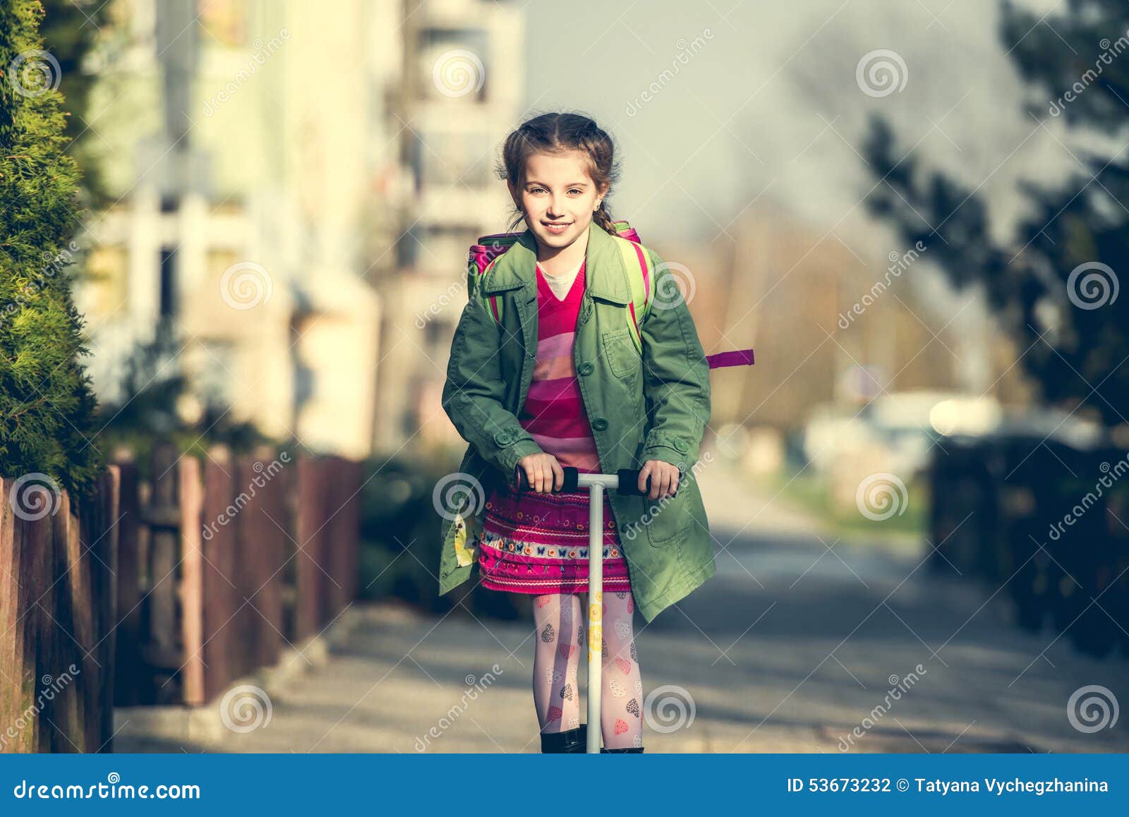 Girl returning from school stock photo. Image of education - 53673232