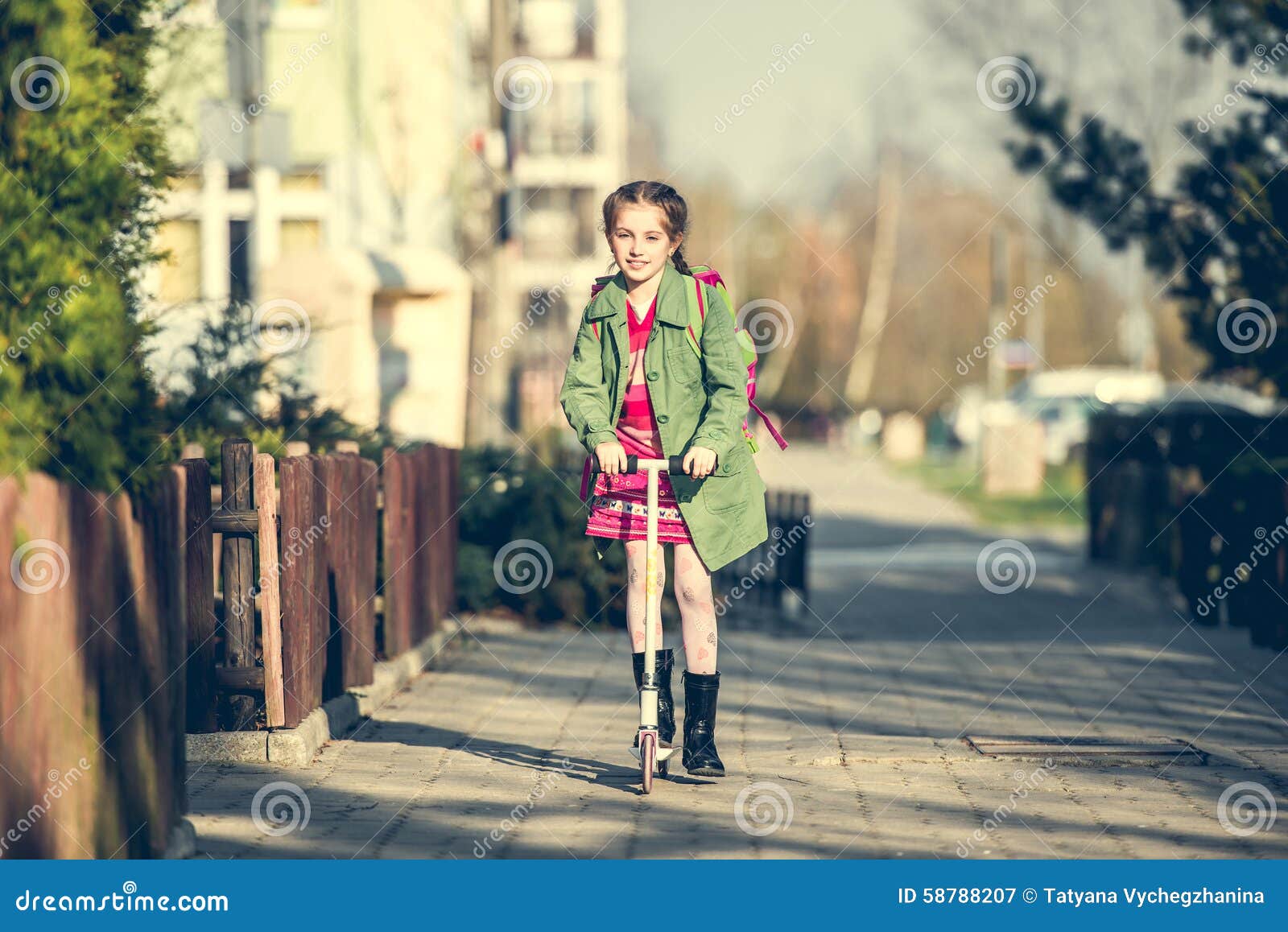 Girl returning from school stock image. Image of building - 58788207