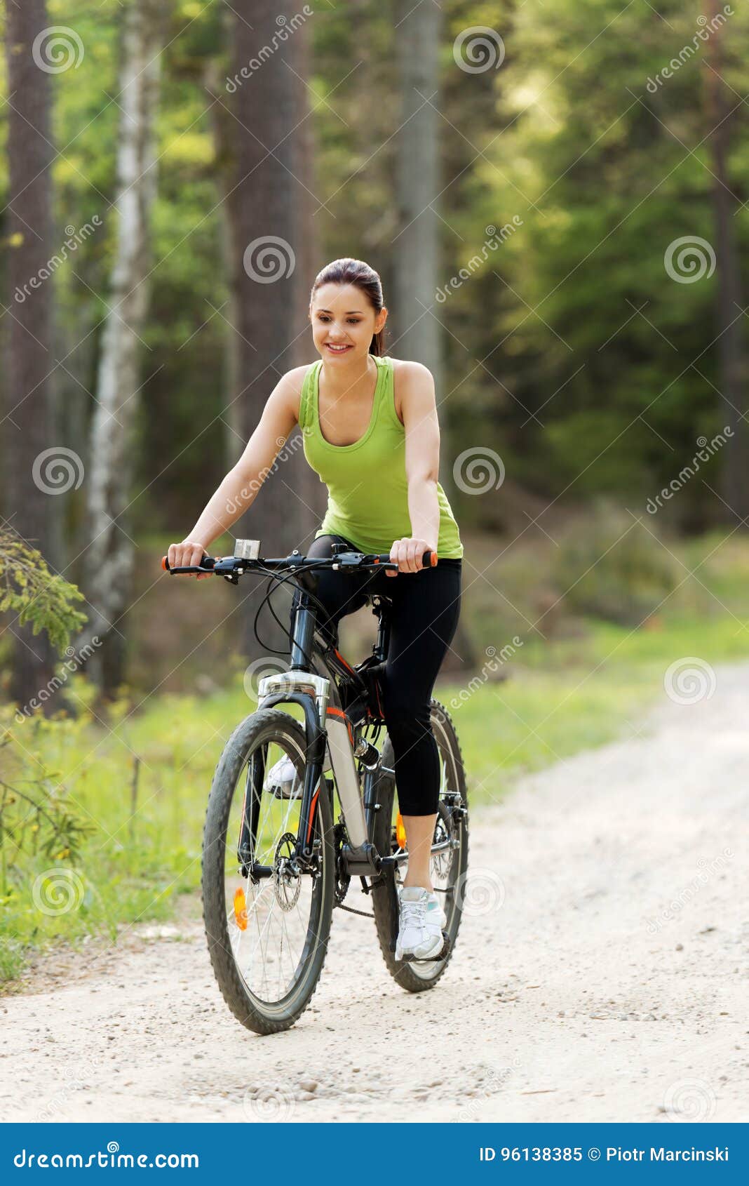 The Girl Rides a Bicycle in the Park. Stock Image - Image of bike, girl ...