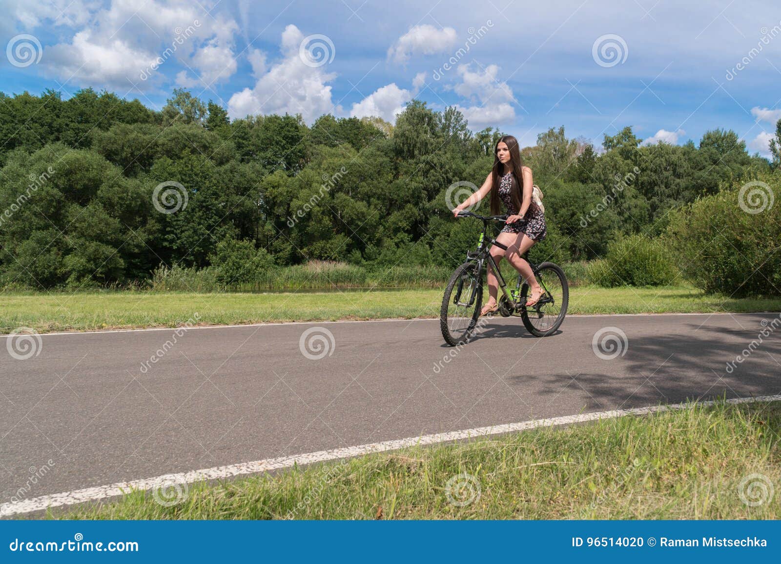 Girl Riding a Bicycle. Side View Stock Photo - Image of boho, bike ...