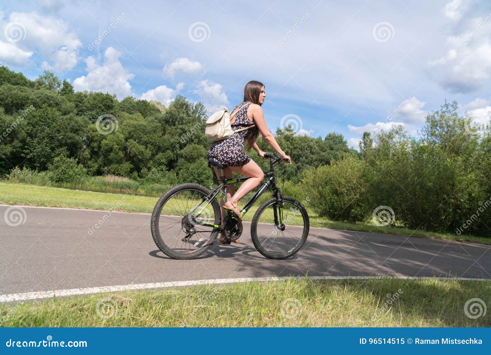 Girl Riding a Bicycle. Side View Stock Image - Image of pretty, enjoy ...