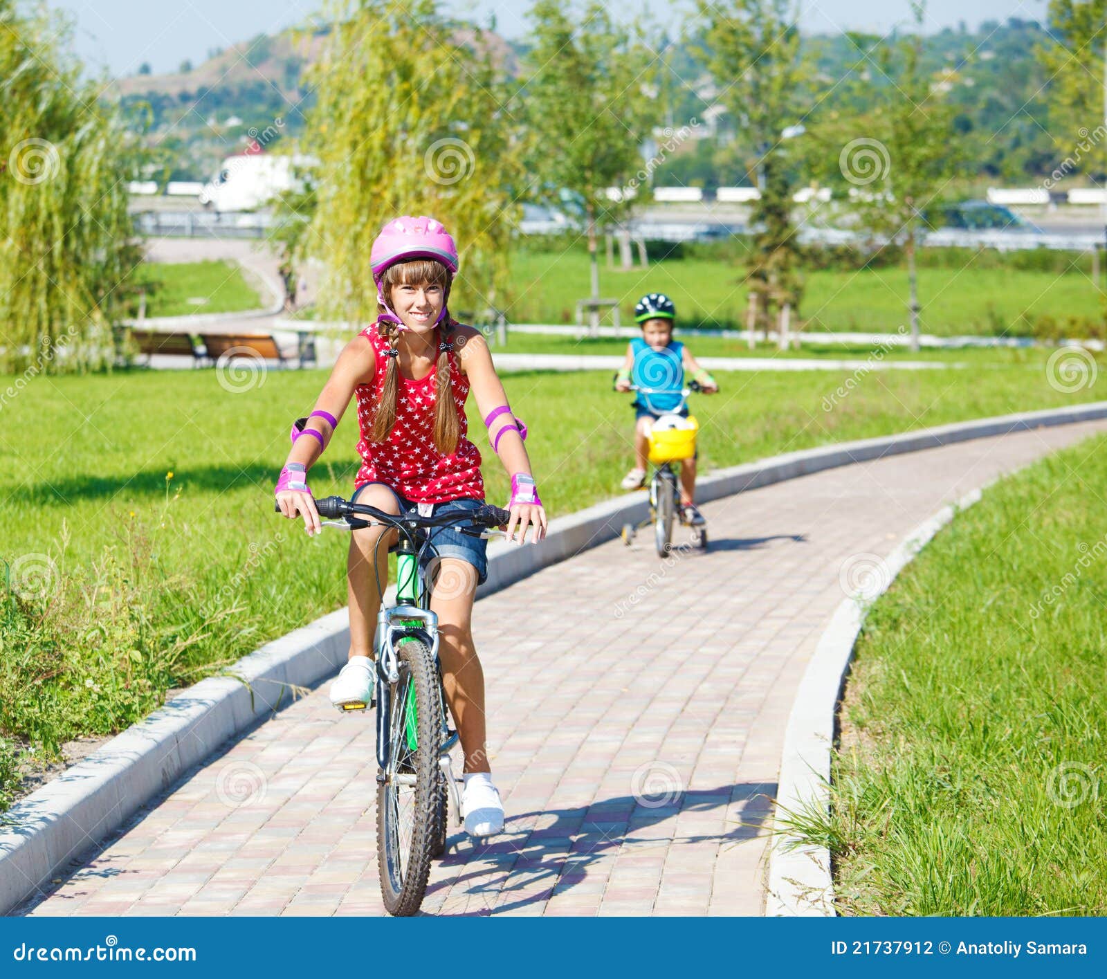 Girl riding a bike stock photo. Image of cycling, sister - 21737912