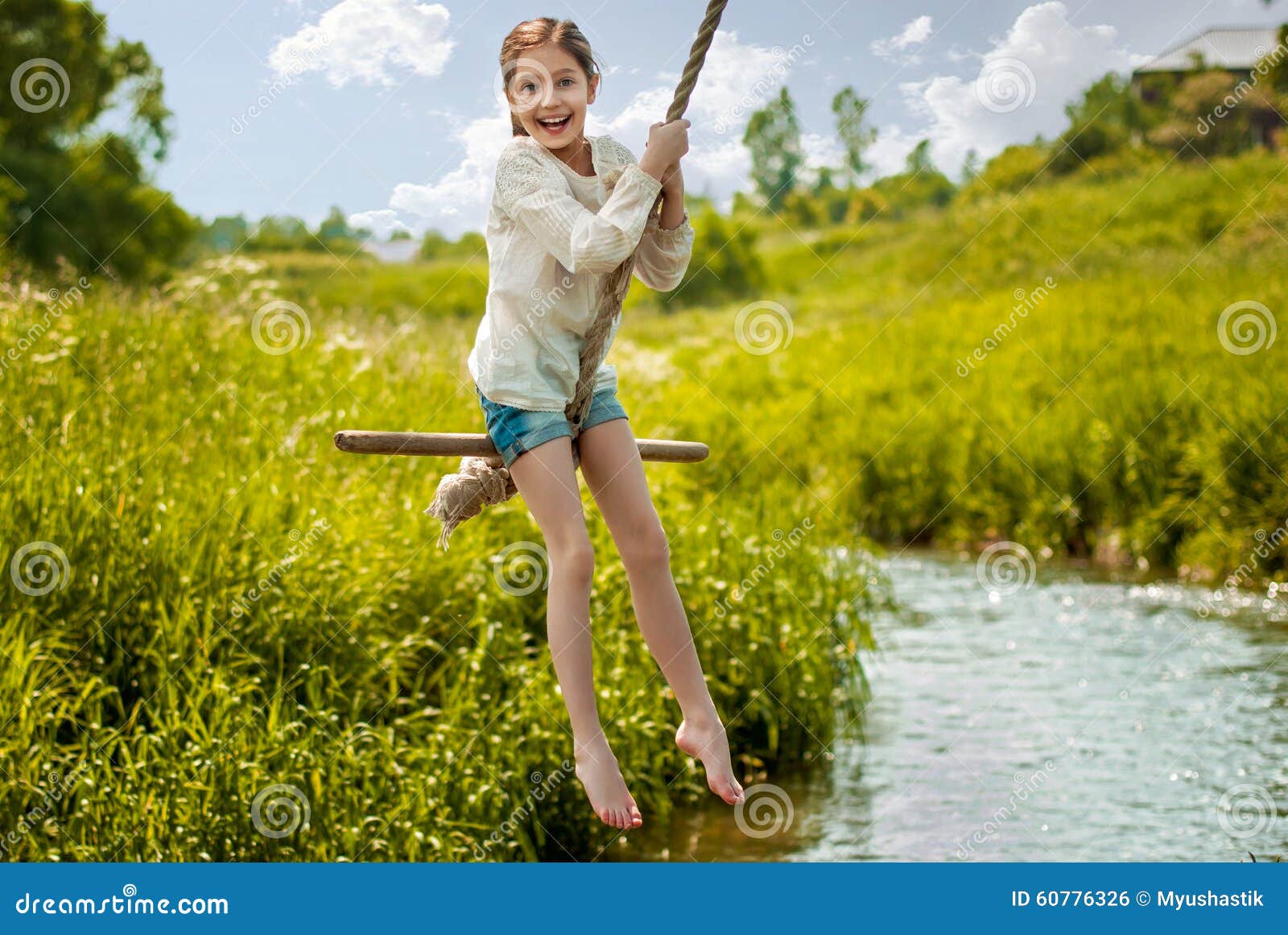Girl riding a bungee stock photo. Image of child, summer - 60776326