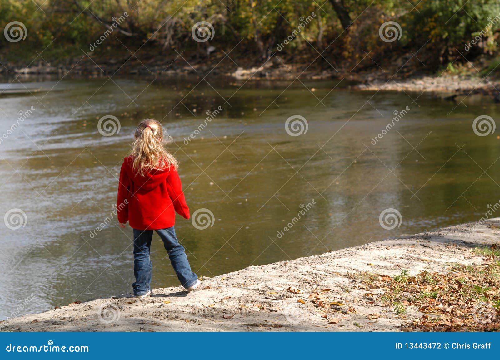 Girl on a Riverbank stock photo. Image of environment - 13443472