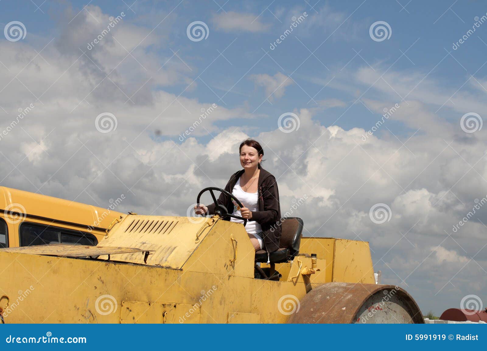 Girl on road-roller stock image. Image of girls, human - 5991919