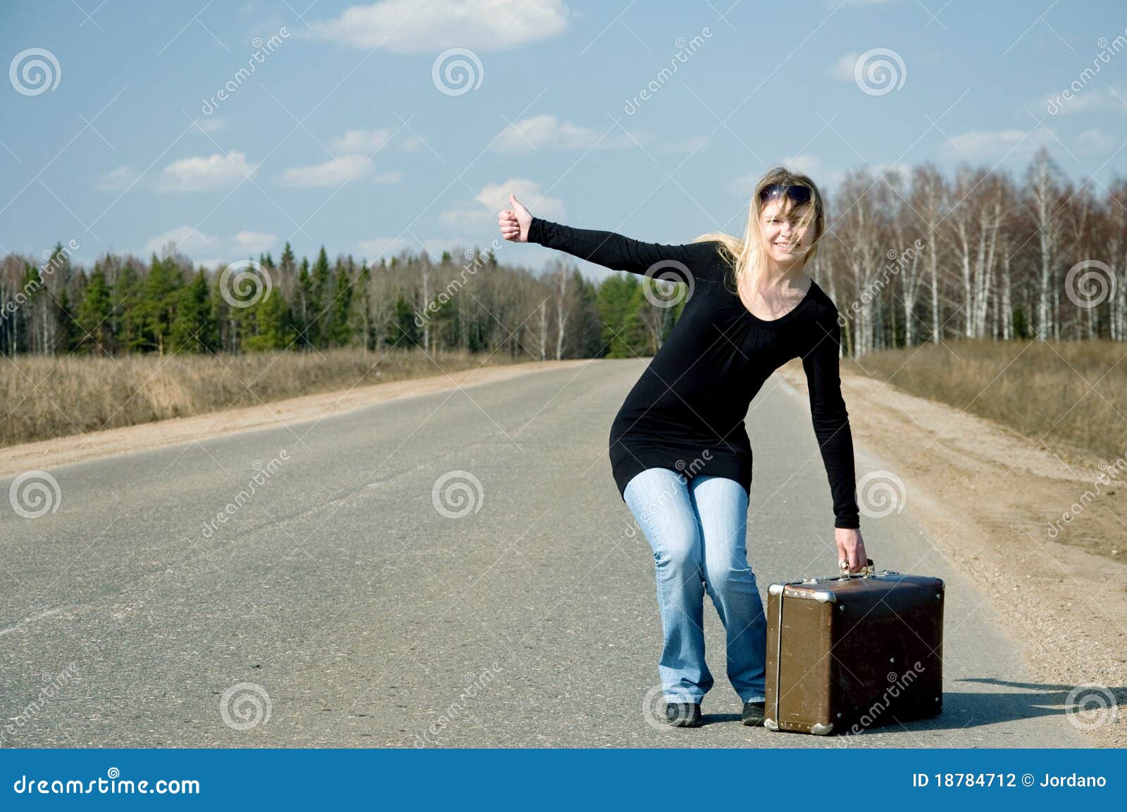 Girl on the Road Waiting for a Car Stock Photo - Image of street, road ...
