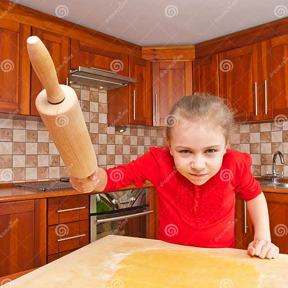 Girl with rolling pin stock photo. Image of holidays - 48255412