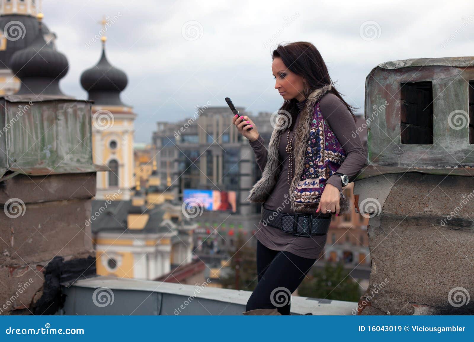Girl on the roof stock image. Image of long, building - 16043019