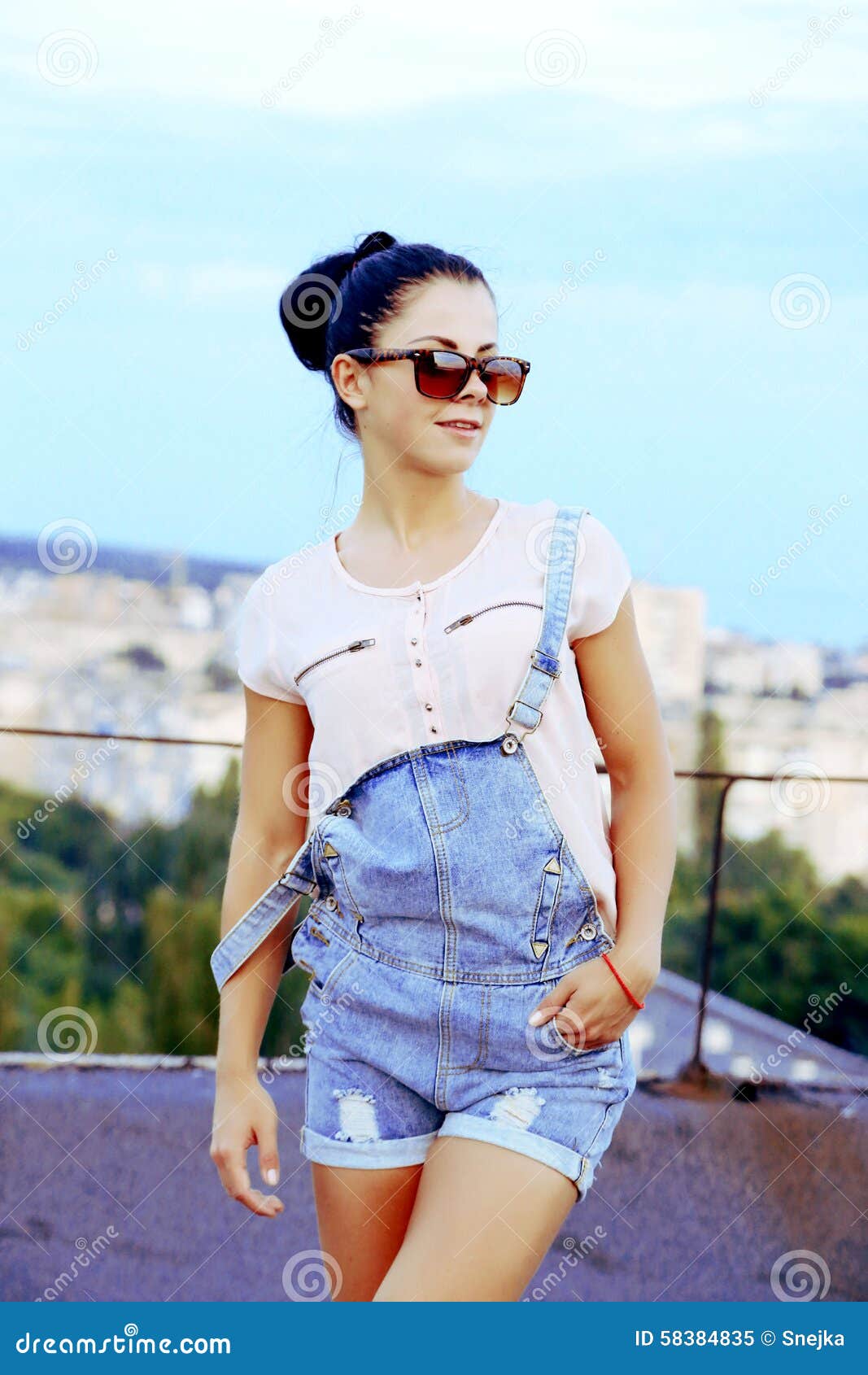 Girl on the roof stock image. Image of coveralls, advertising - 58384835