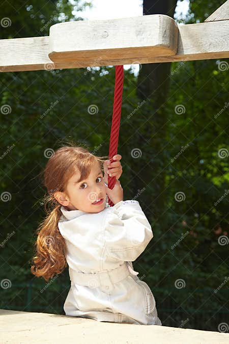 Girl with rope stock photo. Image of rope, power, vertical - 11154806