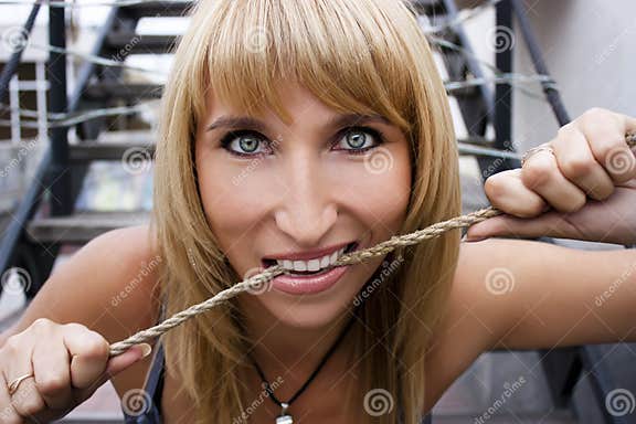 A girl with a rope stock photo. Image of constrained - 17351970