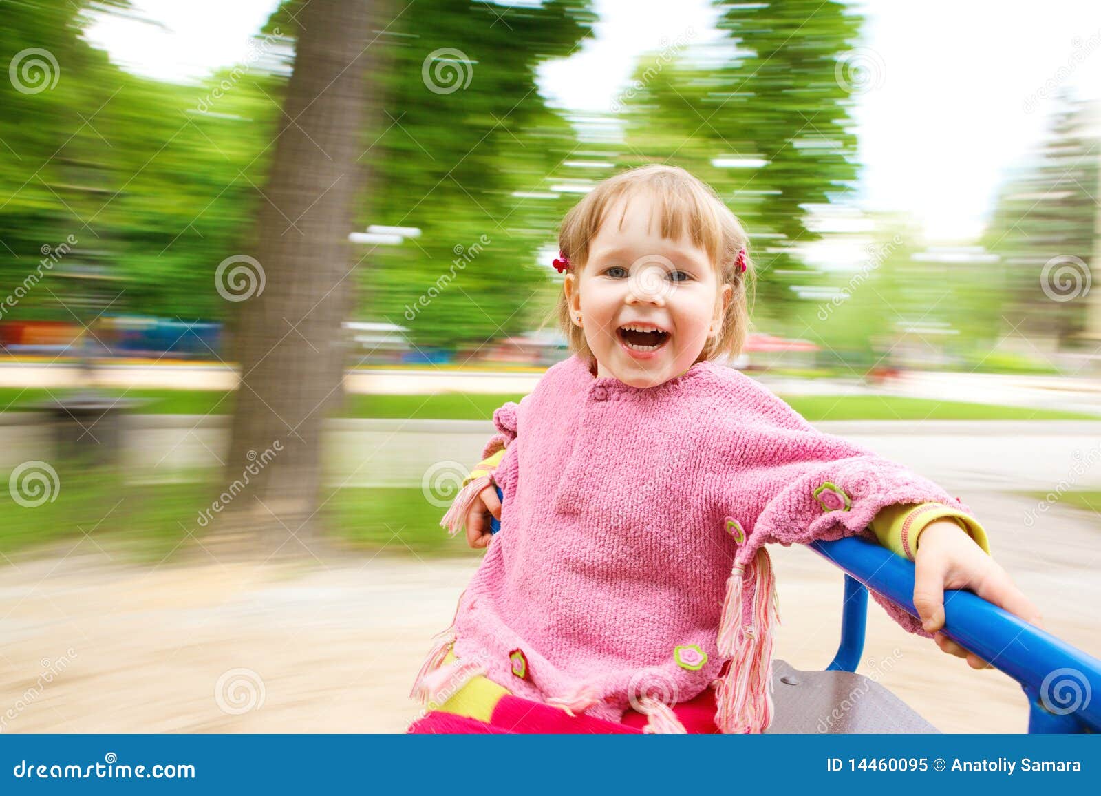Girl on roundabout stock image. Image of happiness, park - 14460095