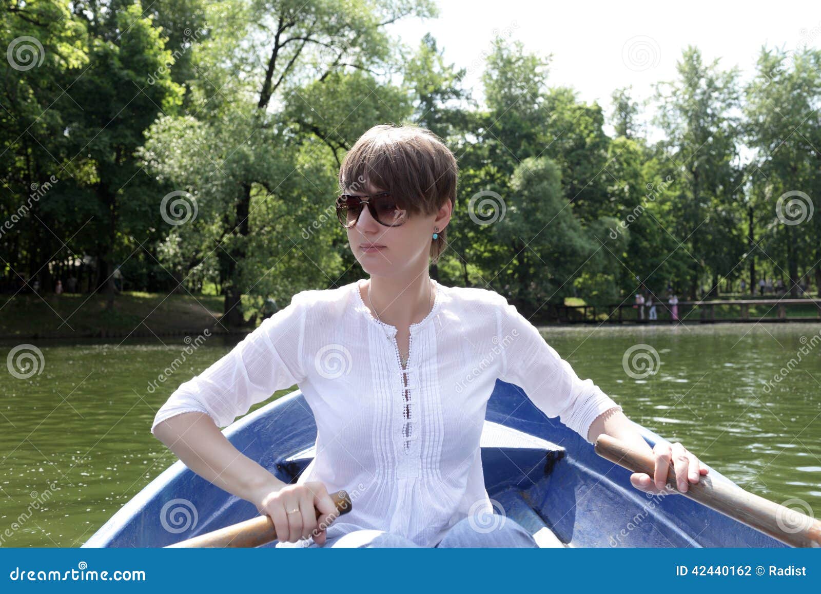 Girl rowing boat stock photo. Image of nature, action - 42440162