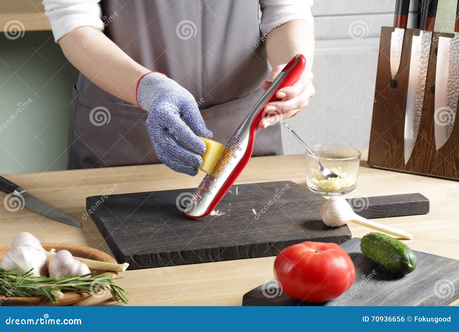 Girl Rubbing Cheese on a Grater Stock Photo - Image of cheese, eating ...
