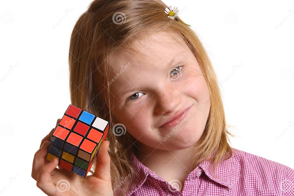 Girl with Rubik s cube editorial photography. Image of happy - 13807607