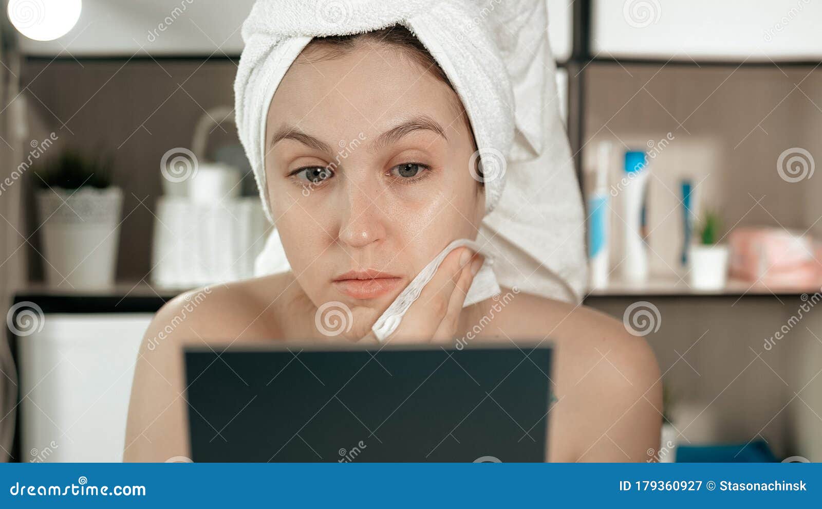 Girl Rubs Her Face Attractive Woman In Bathroom With White Towel On