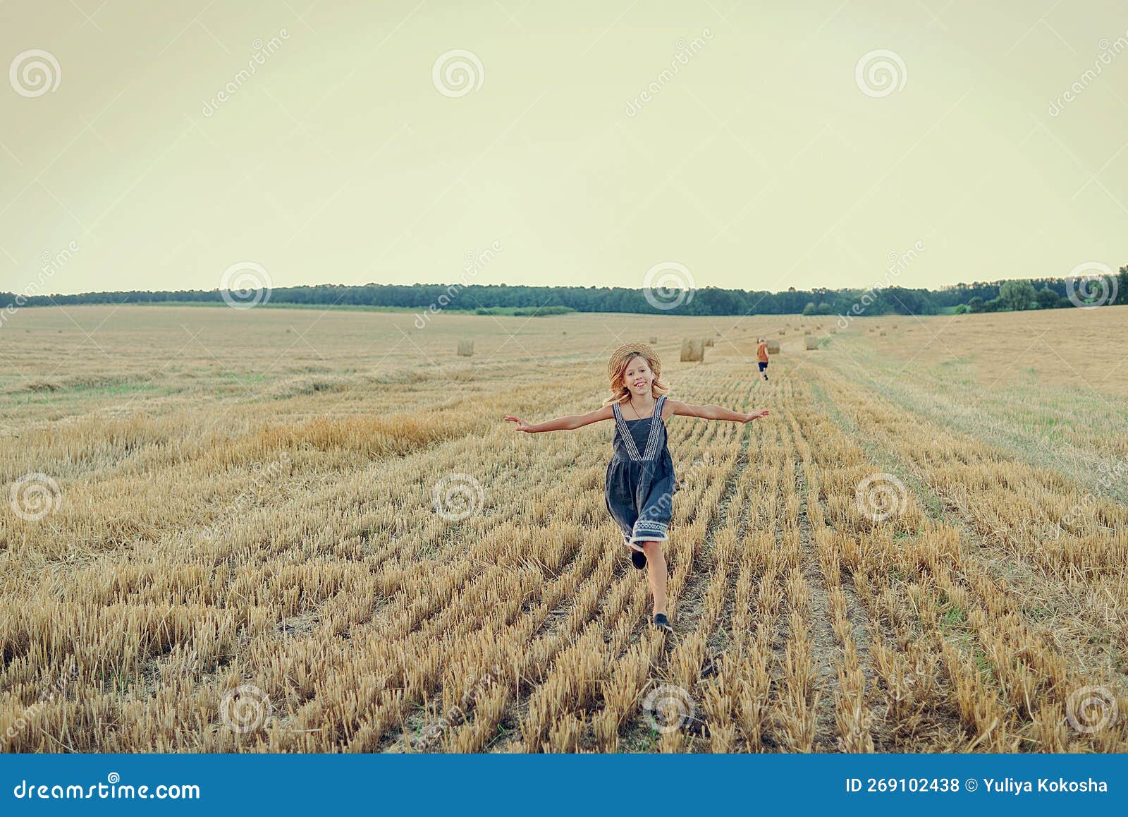 Girl Running Across Field in the Sunset Stock Photo - Image of ...