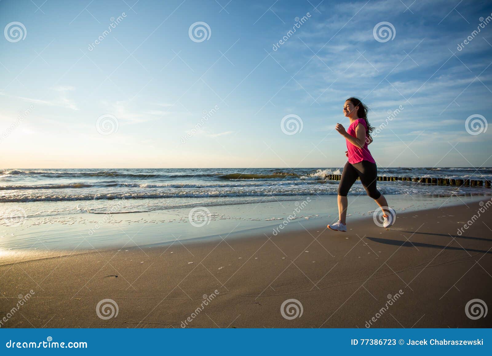 Girl running on beach stock image. Image of slimming - 77386723