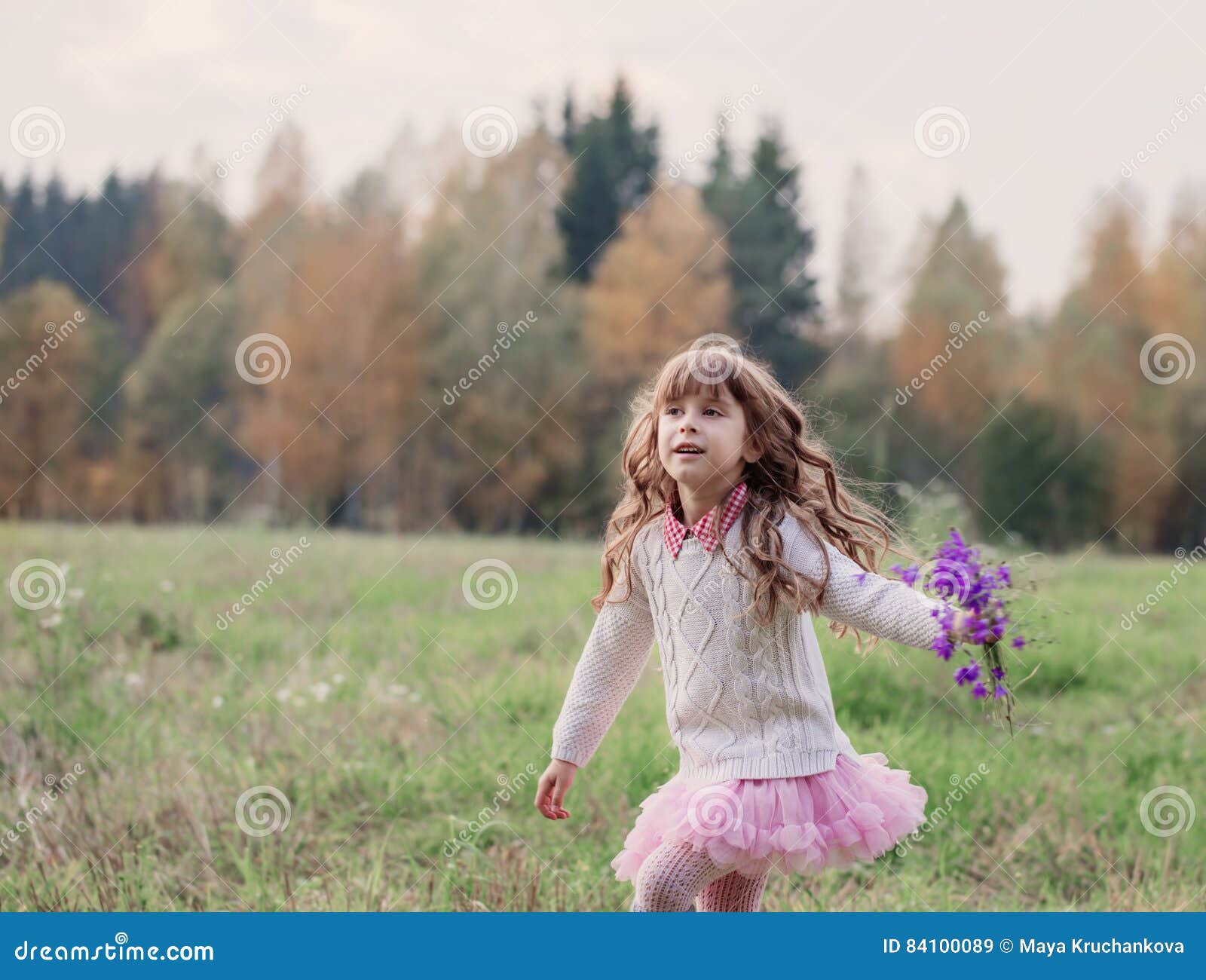 Girl Running in Field with Flowers Stock Image - Image of curly ...