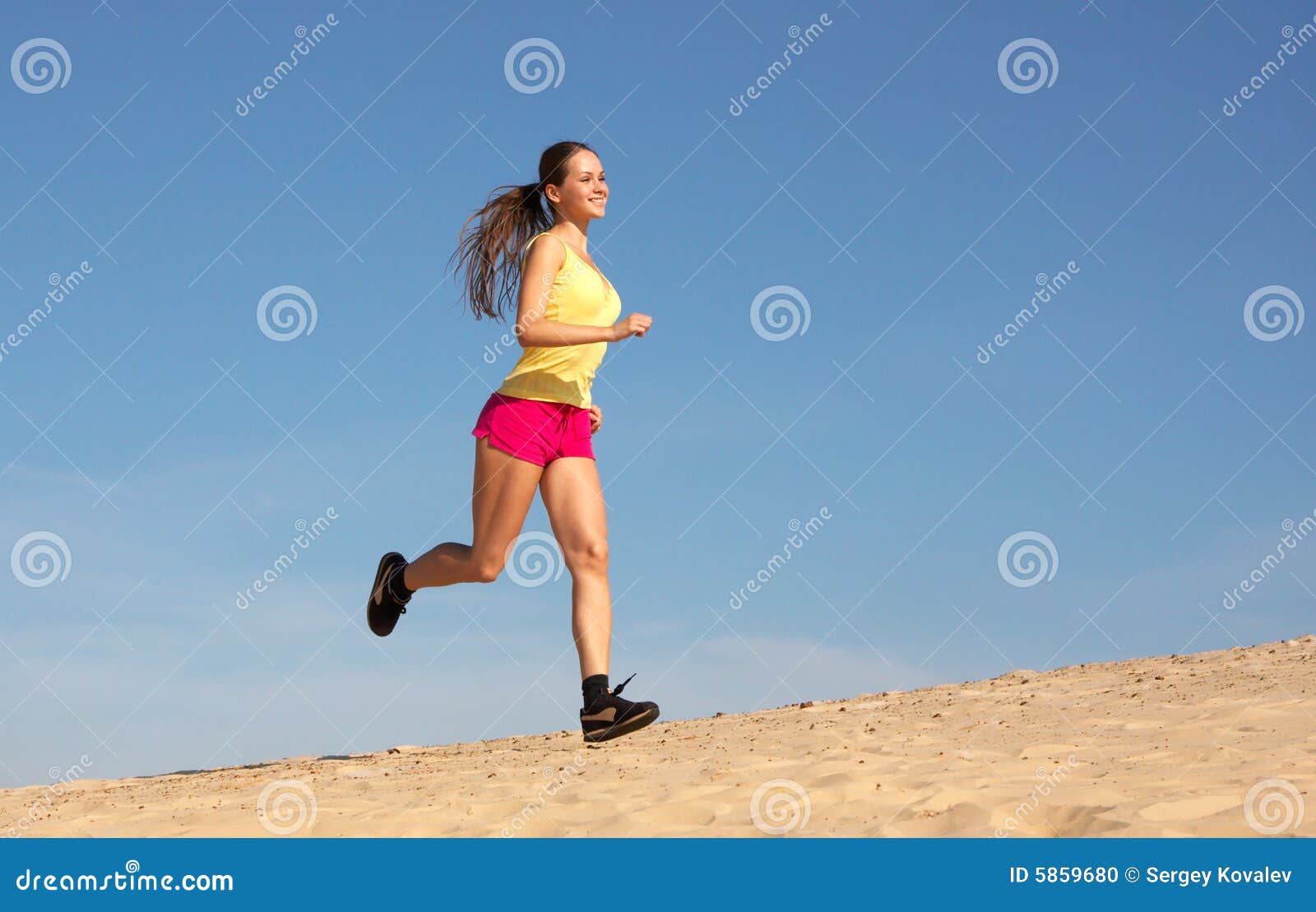 Girl running on sand stock photo. Image of teenage, athletic - 5859680