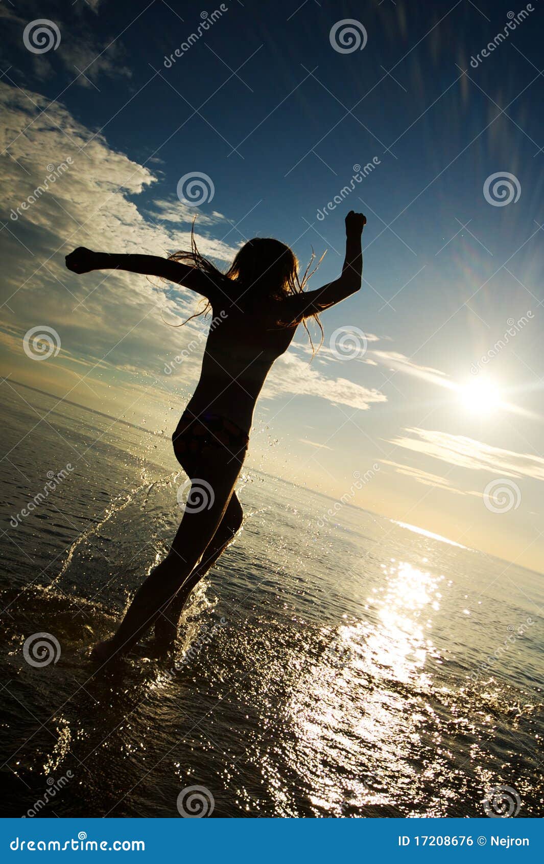 Girl running in the sea stock photo. Image of fitness - 17208676