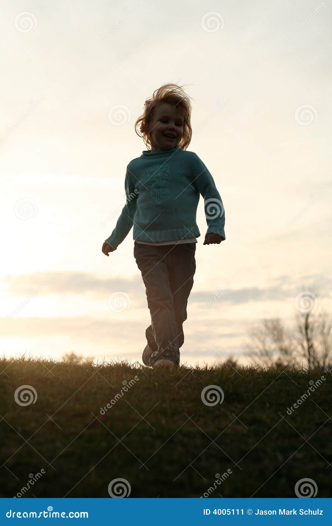 Girl running at sunset stock image. Image of sweater, hair - 4005111