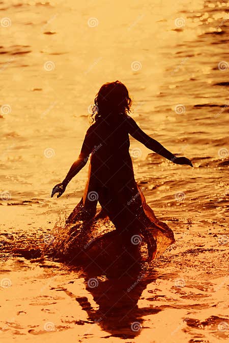 Girl running in the water stock photo. Image of girl, happiness - 726736