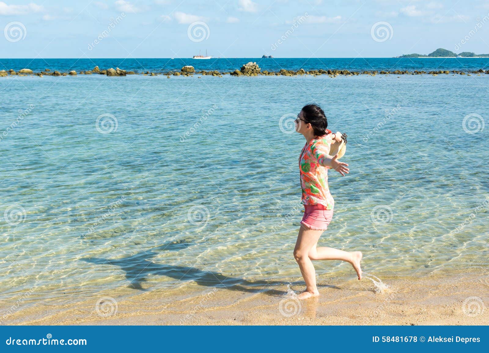 Girl running on the waves stock photo. Image of athletic - 58481678