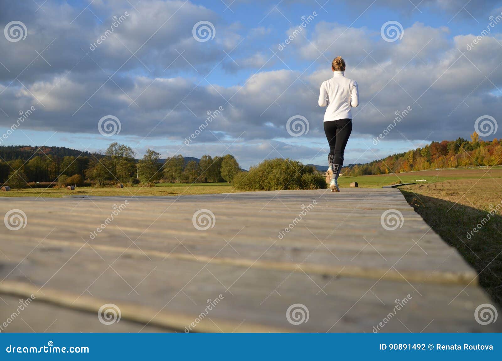 Girl Running on the Wooden Pavement Stock Photo - Image of foot, active ...