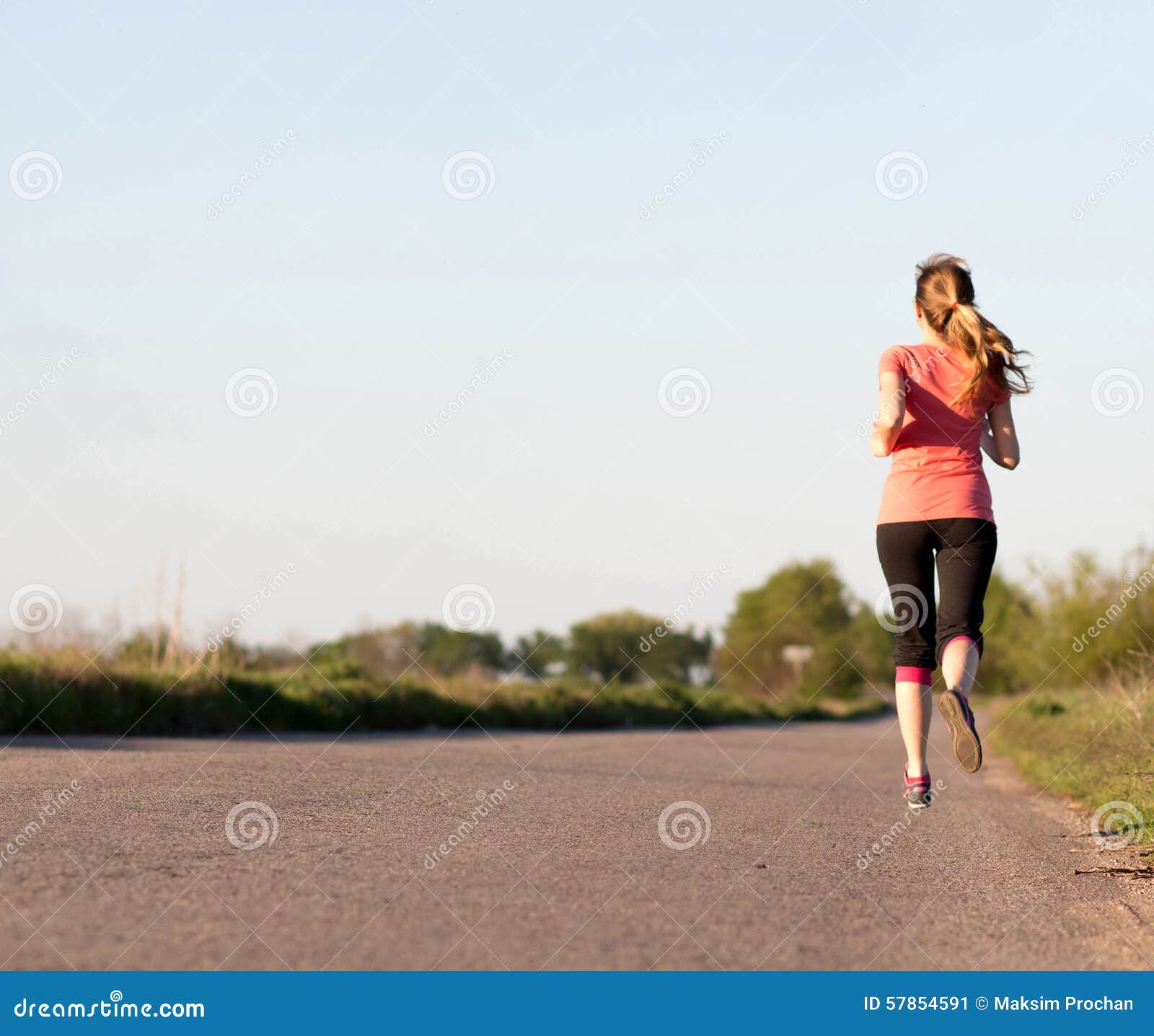 Girl Runs Along the Asphalt Road Stock Image - Image of road, tracksuit ...