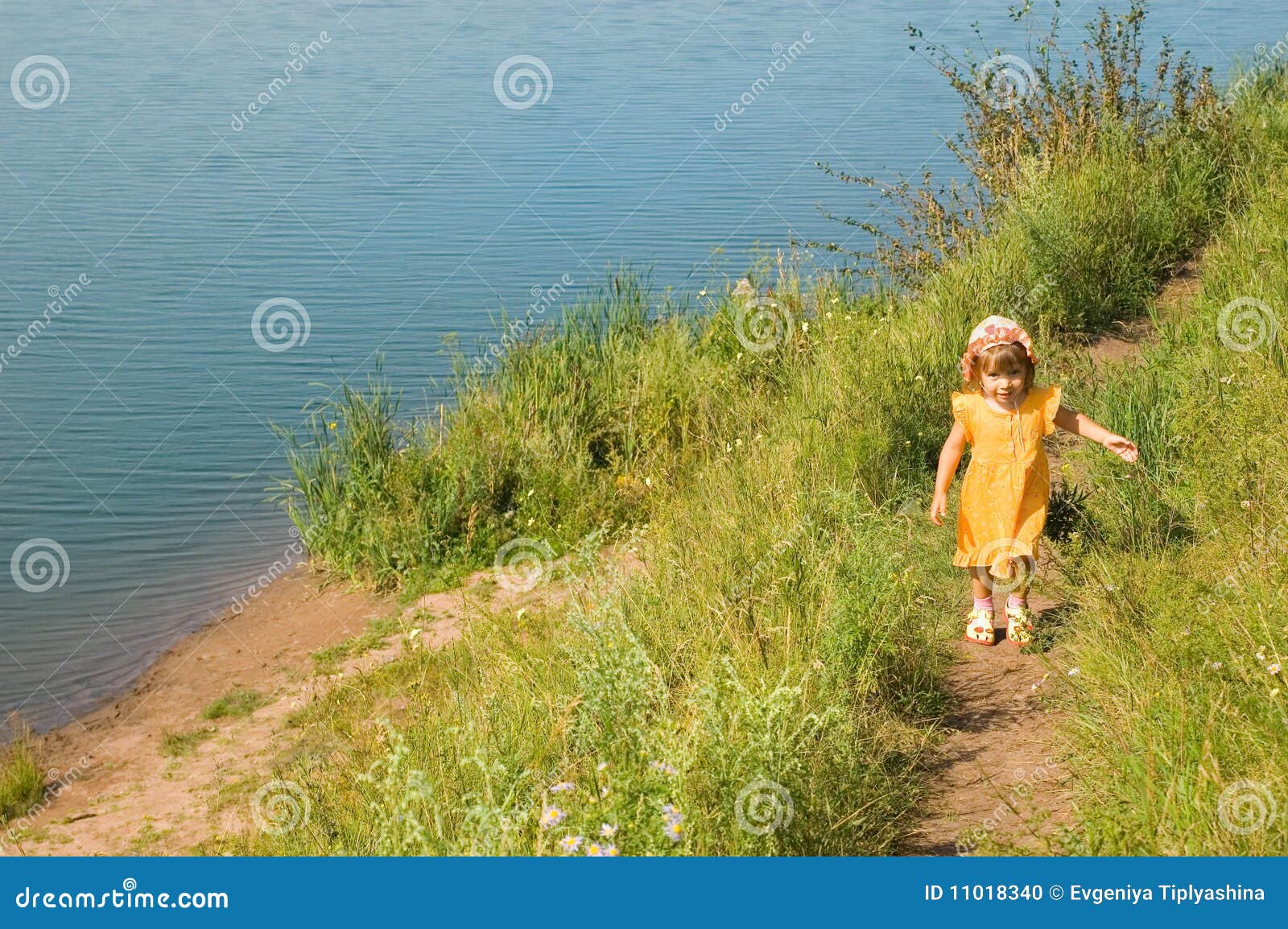 The Girl Runs on River Bank Stock Photo - Image of runs, girl: 11018340