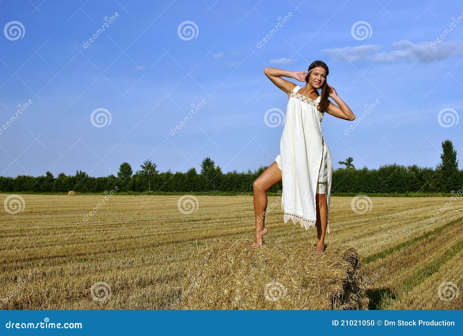 Girl in a Rural Clothing Standing on the Haystack Stock Photo - Image ...