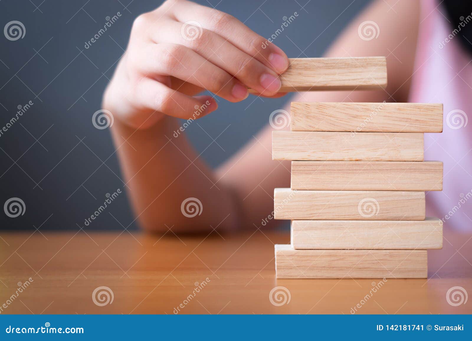 Girl`s Hand Stacking Wooden Blocks Stock Image - Image of shape, growth ...