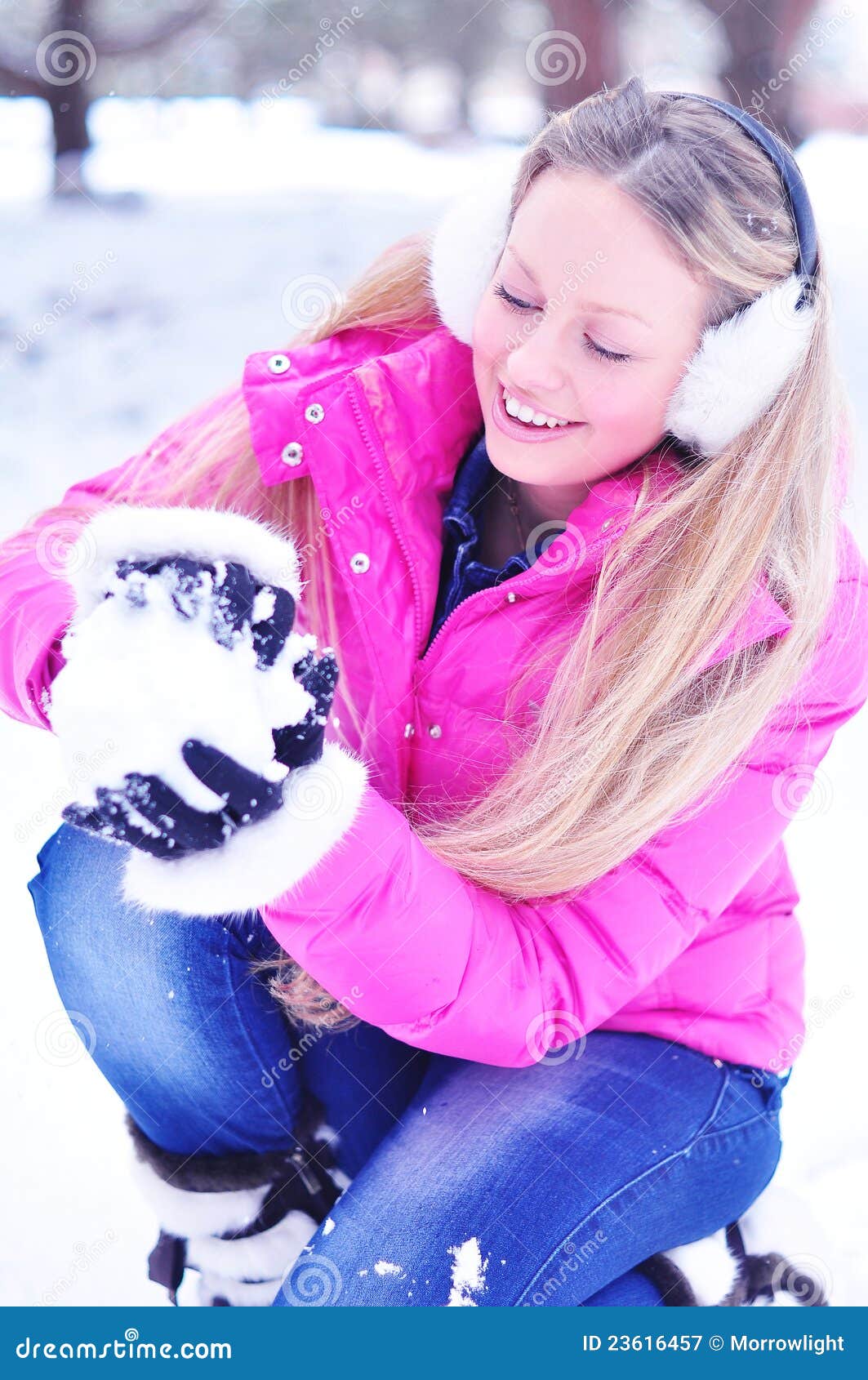 Girl s making a snowball stock image. Image of face, smile - 23616457