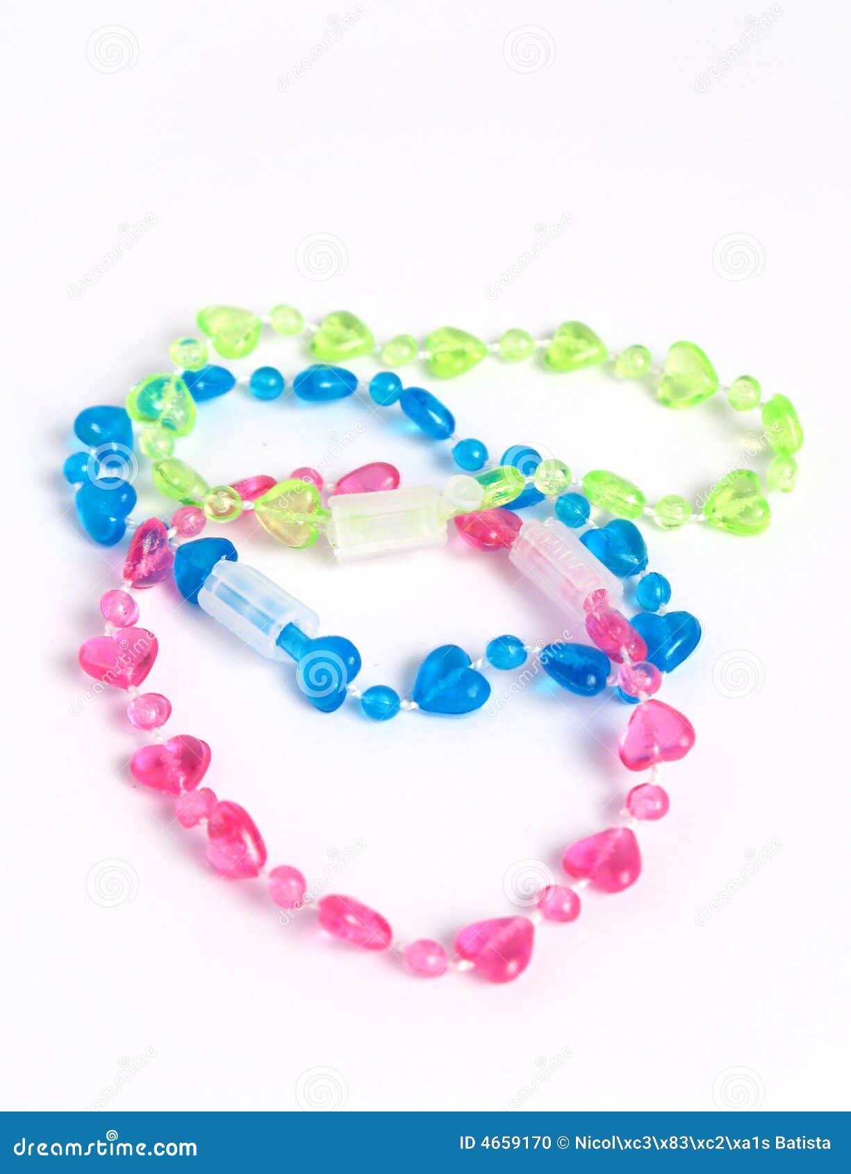 GirlÂ´s plastic bracelet stock photo. Image of bright - 4659170