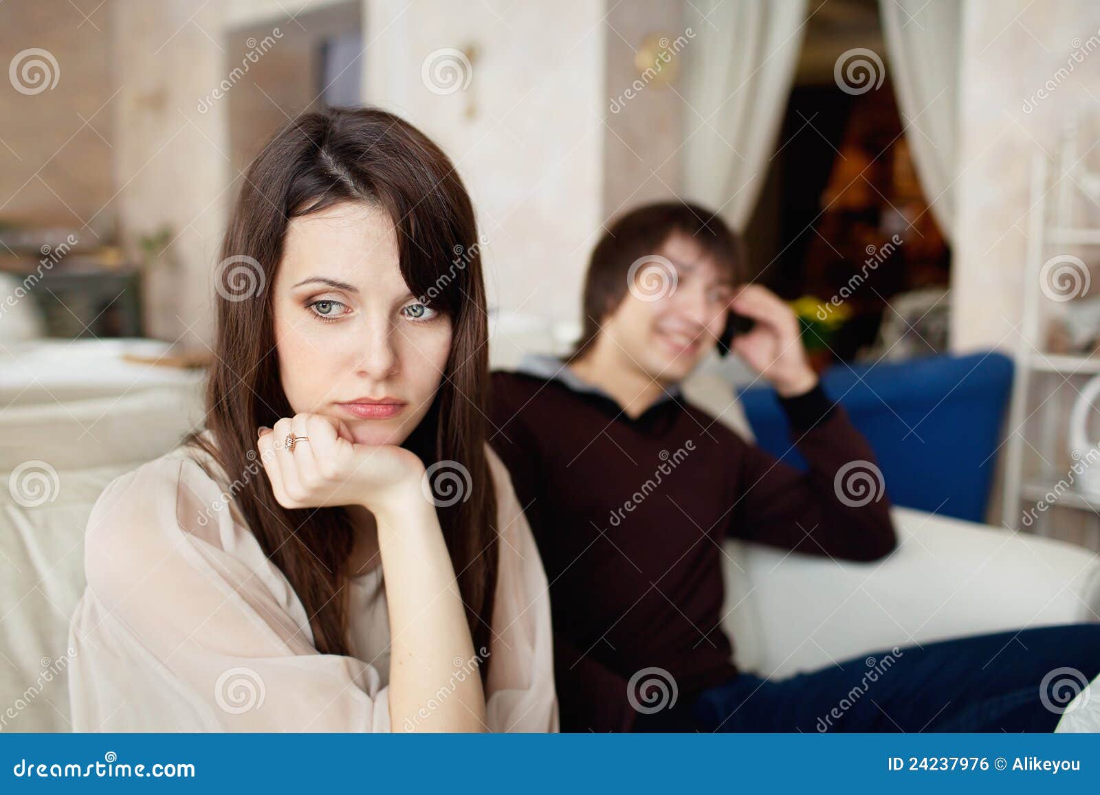 Girl is Sad because a Guy Talking on His Cell Stock Photo - Image of ...
