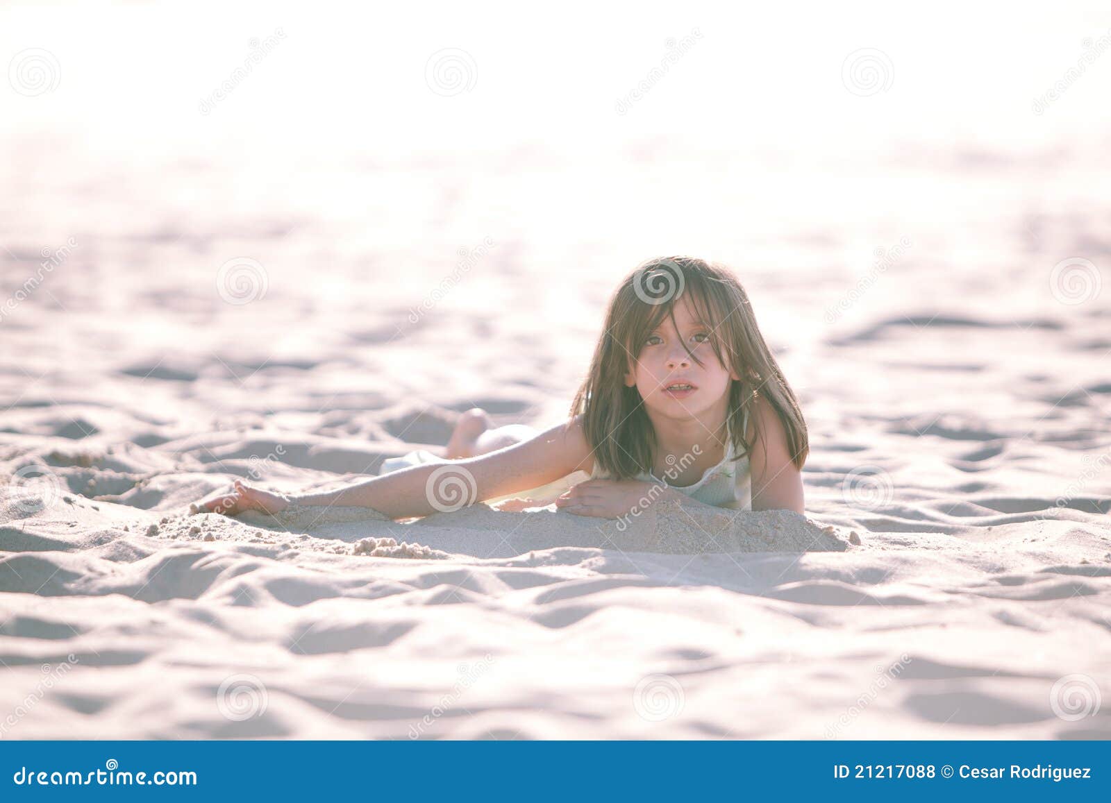Girl in the Sand stock photo. Image of bright, color - 21217088