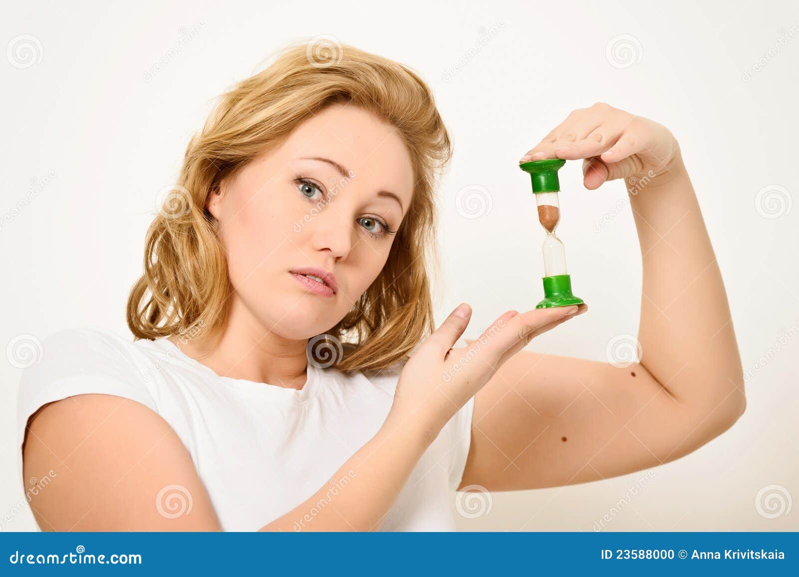 The girl with a sand-glass stock photo. Image of female - 23588000