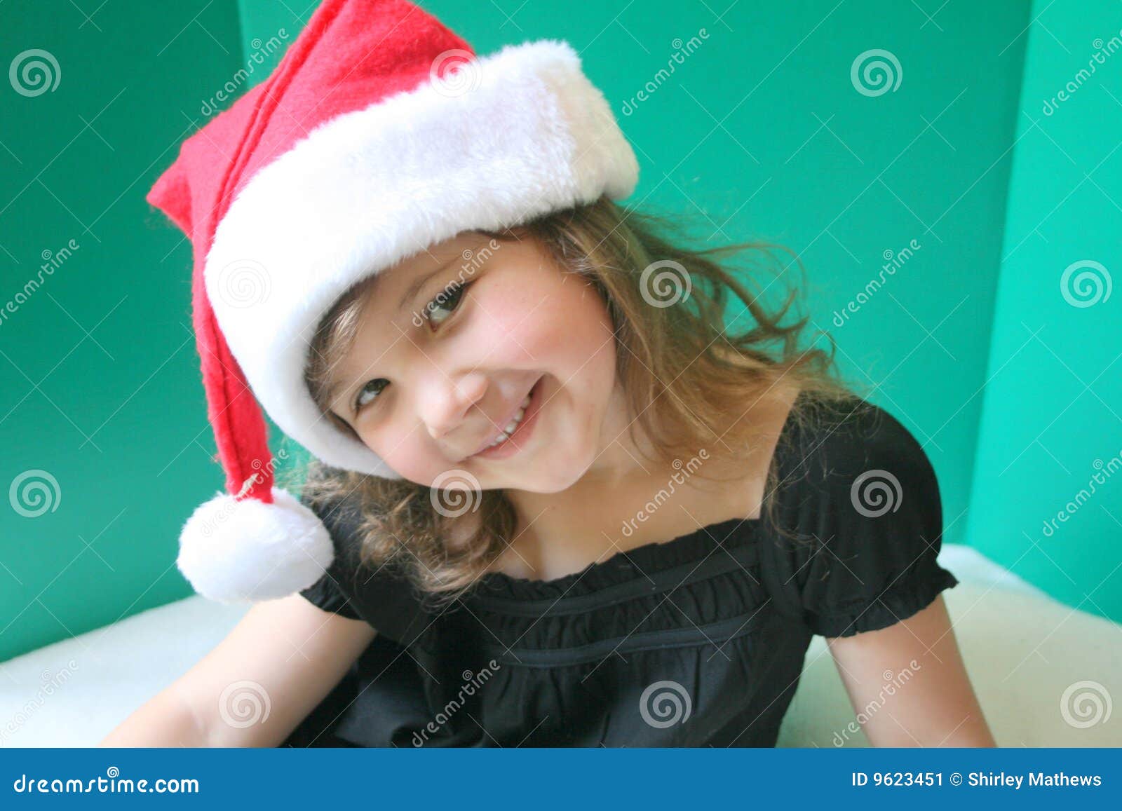 Girl in Santa hat stock image. Image of girl, little, christmas - 9623451