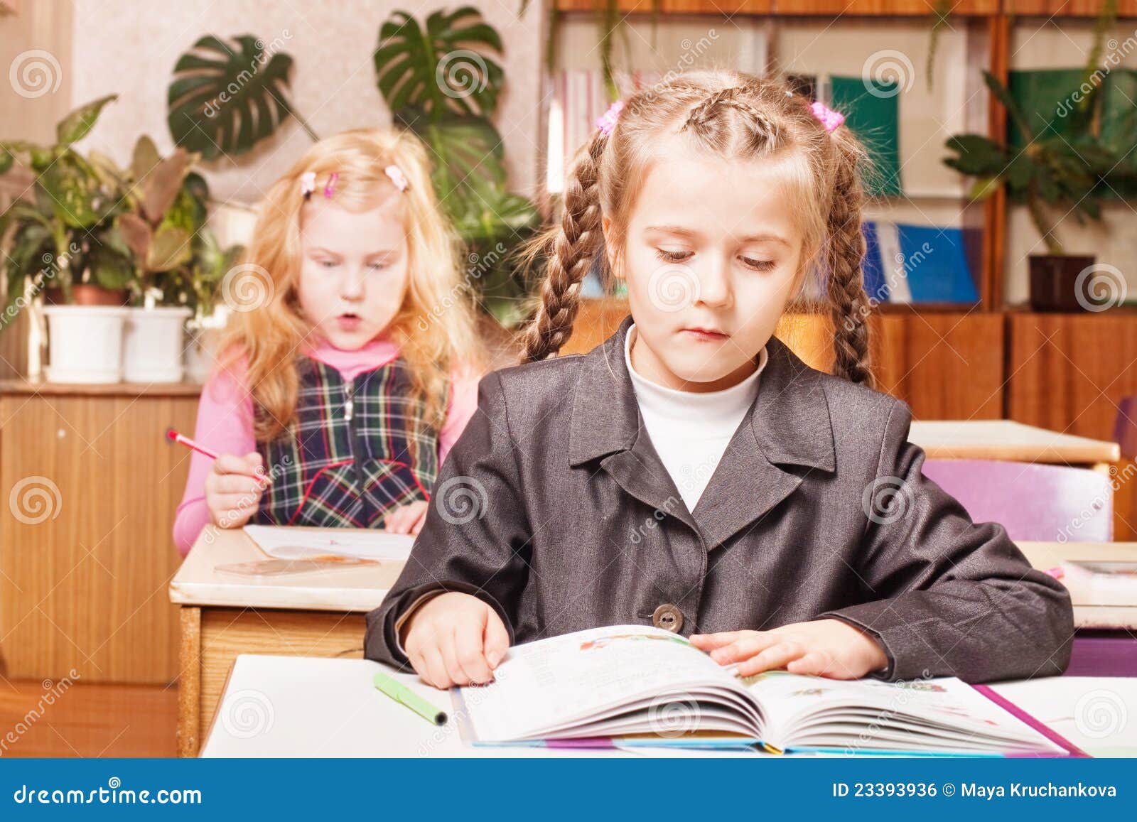 Girl in School at the Desk. Stock Photo - Image of beautiful, home ...