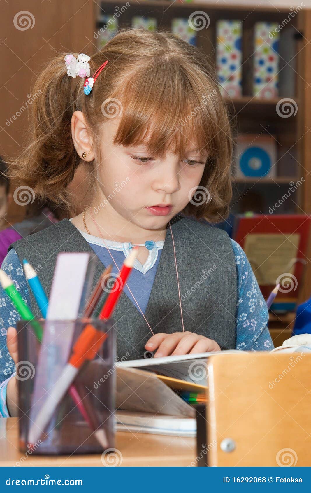 Girl at school at a lesson stock photo. Image of exam - 16292068