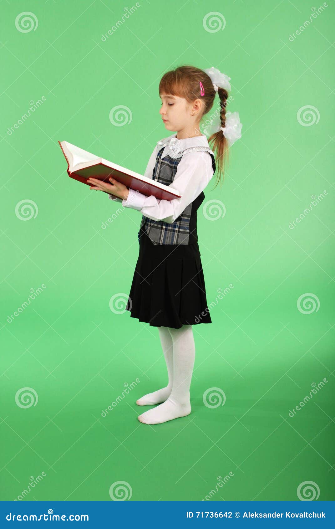Girl in School Uniform Reading a Book Stock Photo - Image of person ...