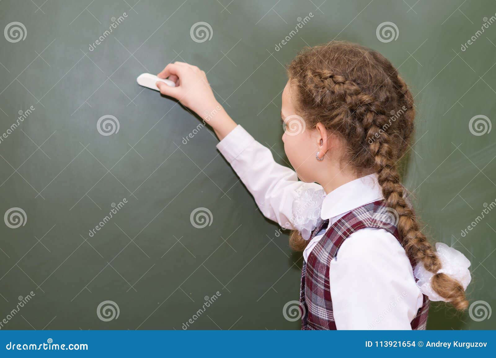 Girl in School Uniform Writes with Chalk on Blackboard Stock Photo ...