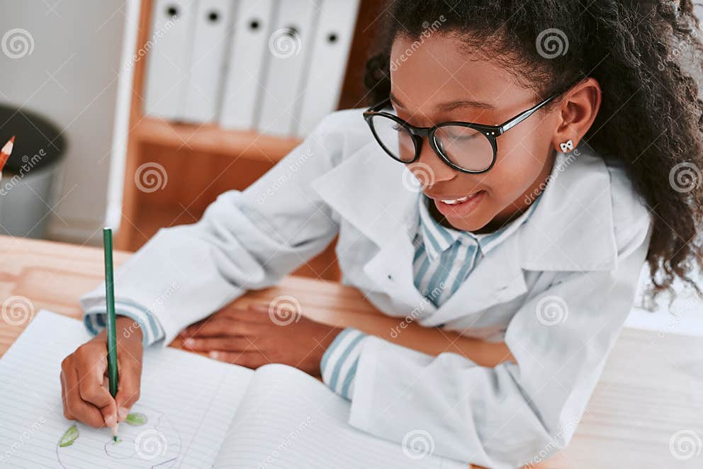 Girl, School and Write in Science Classroom, Education and Learning or ...