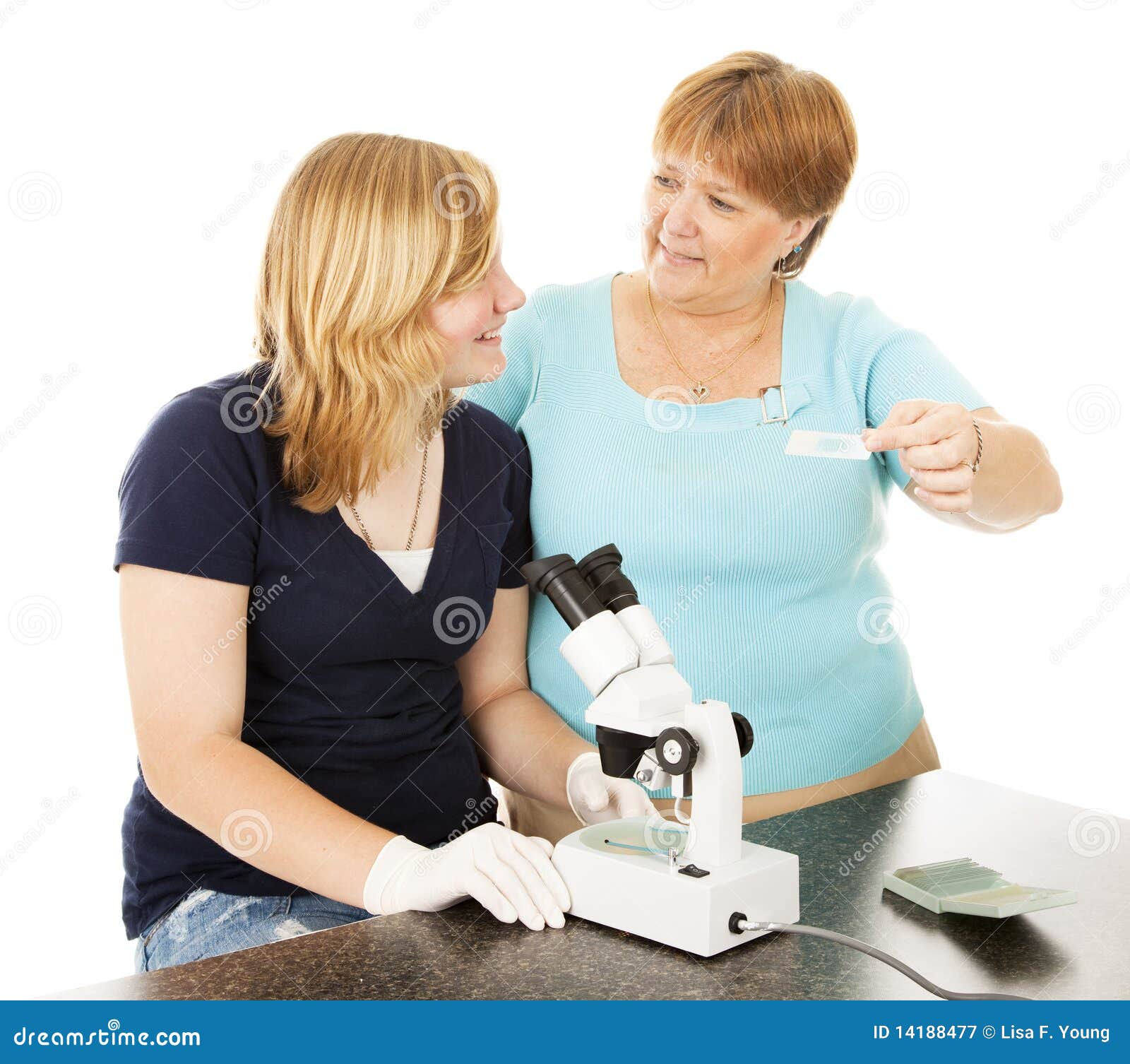 Girl with Science Teacher stock image. Image of microscope - 14188477