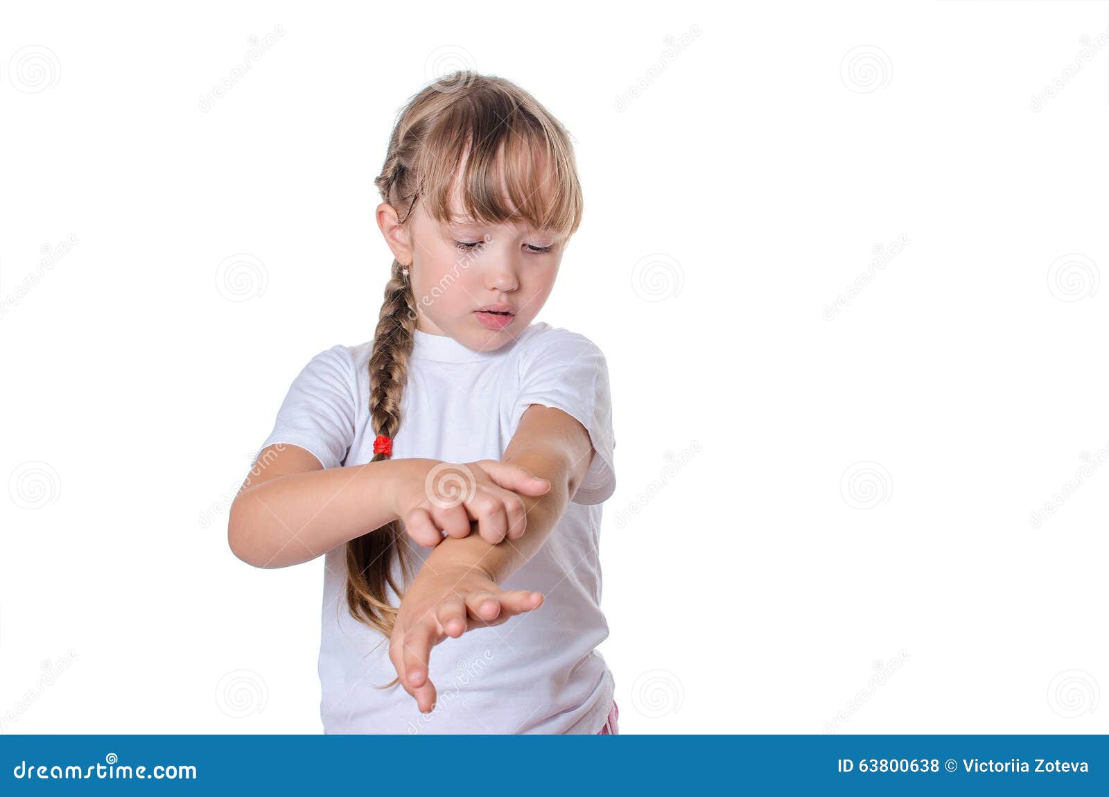 The girl scratches a hand stock photo. Image of small - 63800638
